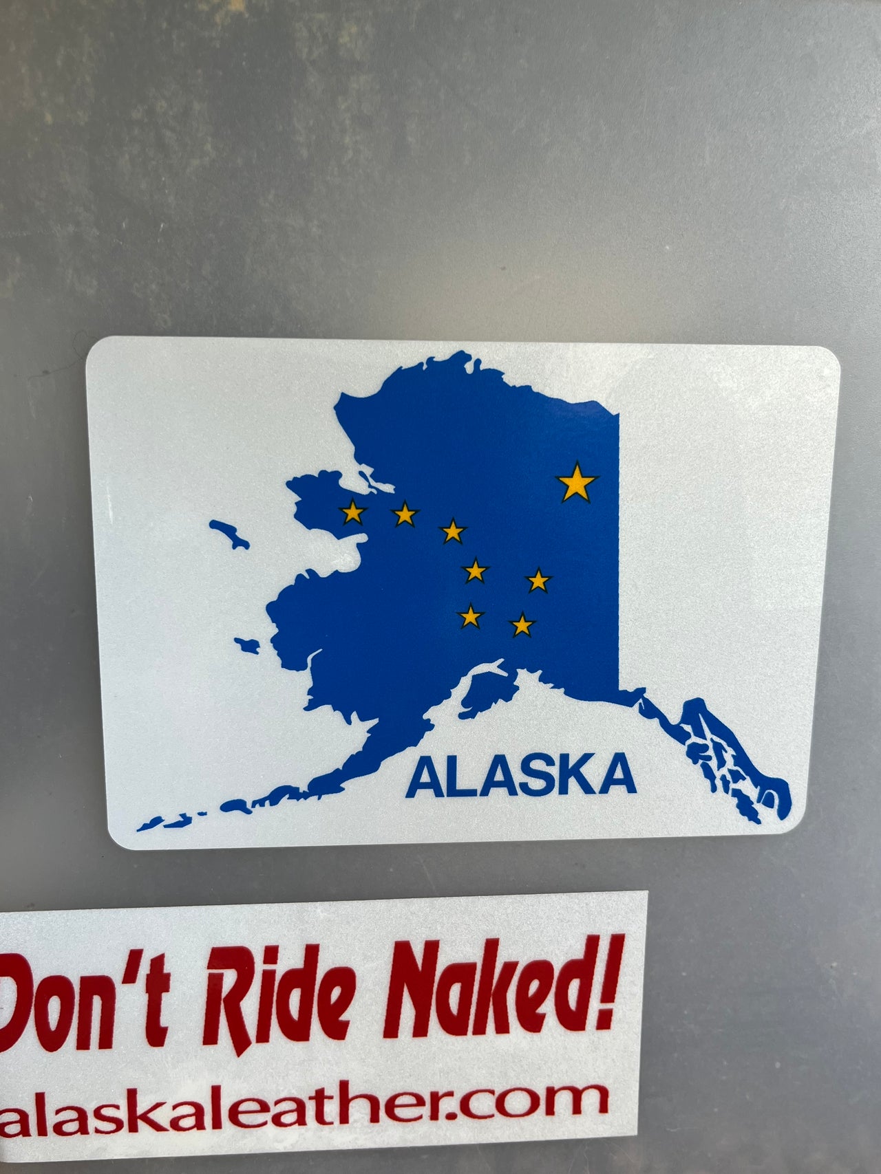 Reflective ALASKA Sticker – Alaska Leather